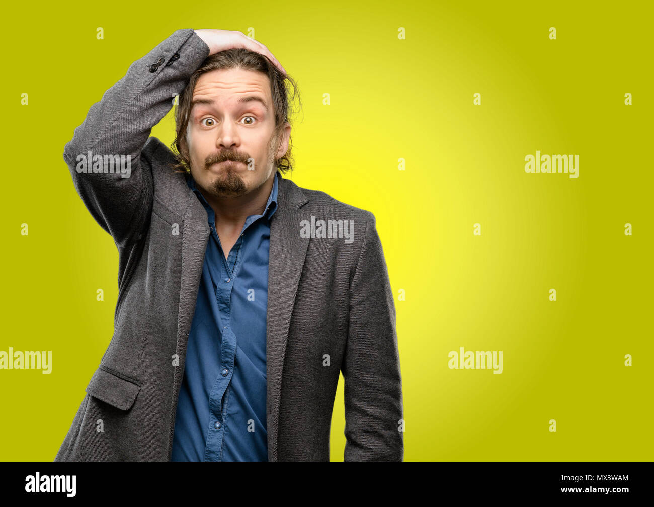 Handsome young man doubt expression, confuse and wonder concept ...