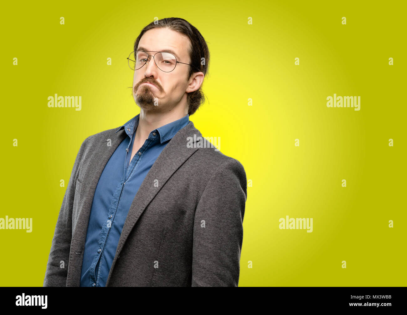 Handsome young man having skeptical and dissatisfied look expressing ...