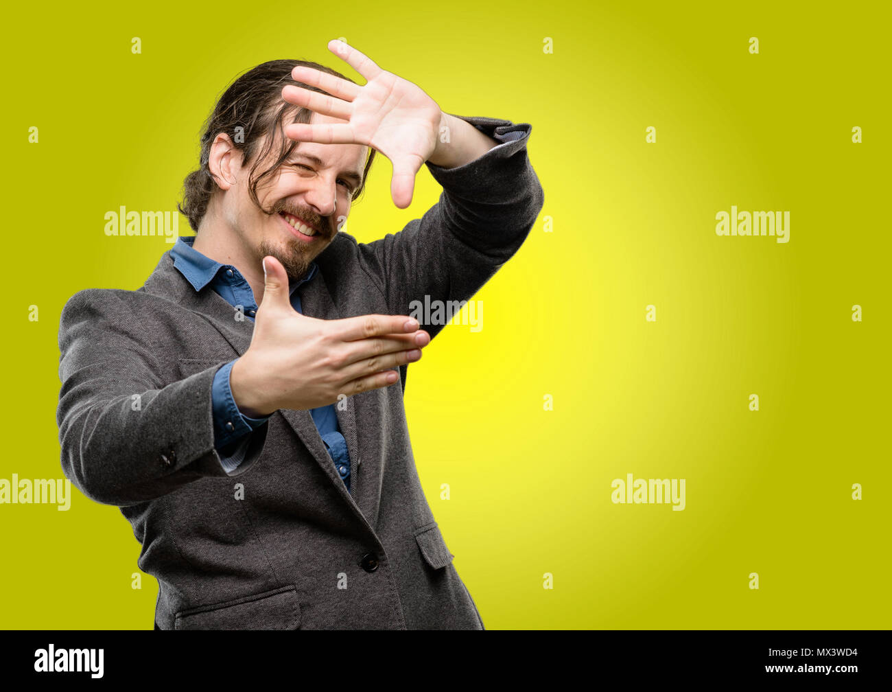 Handsome young man confident and happy showing hands to camera ...