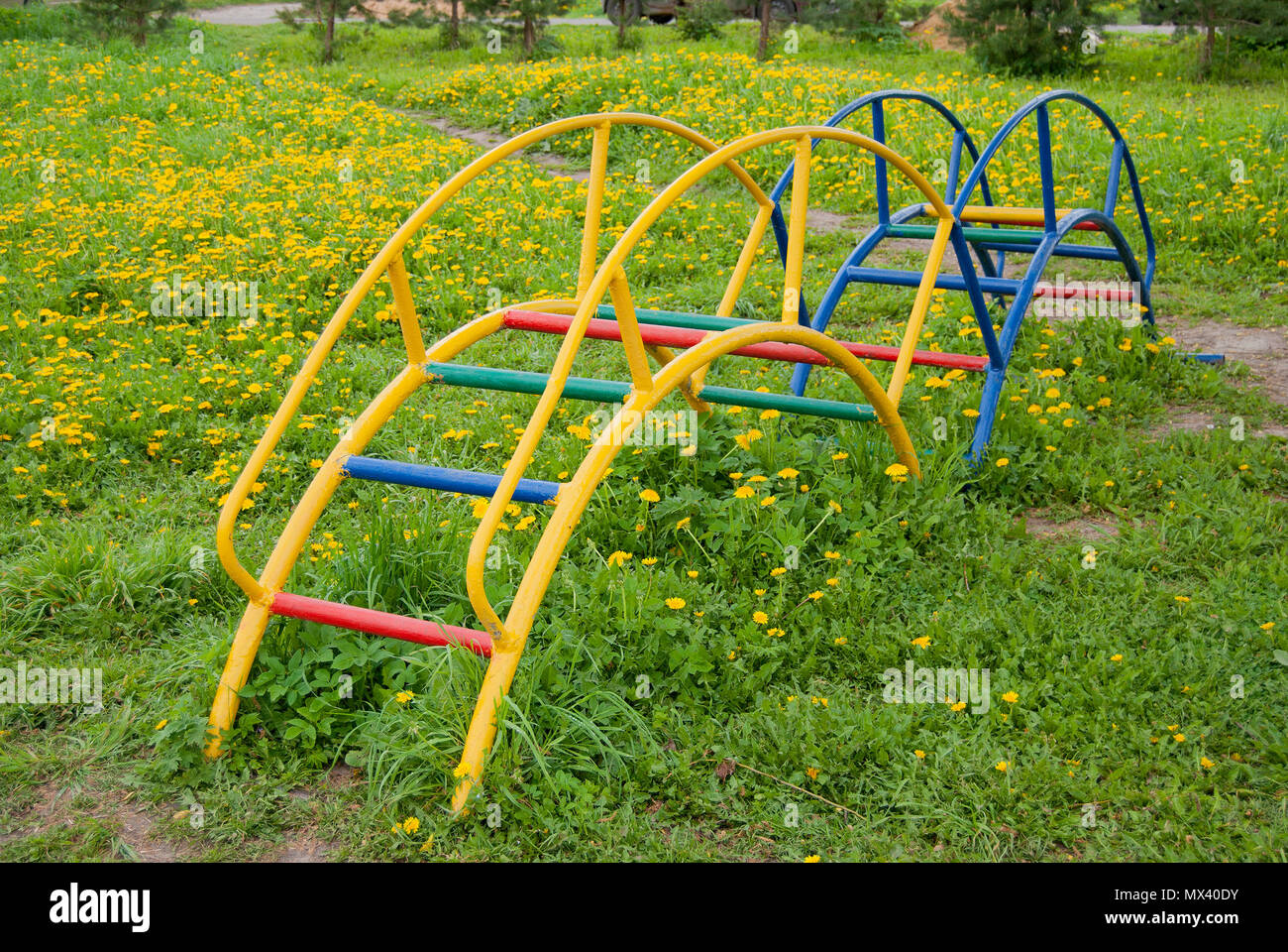 A colorful staircase for children on the playground, against a ...