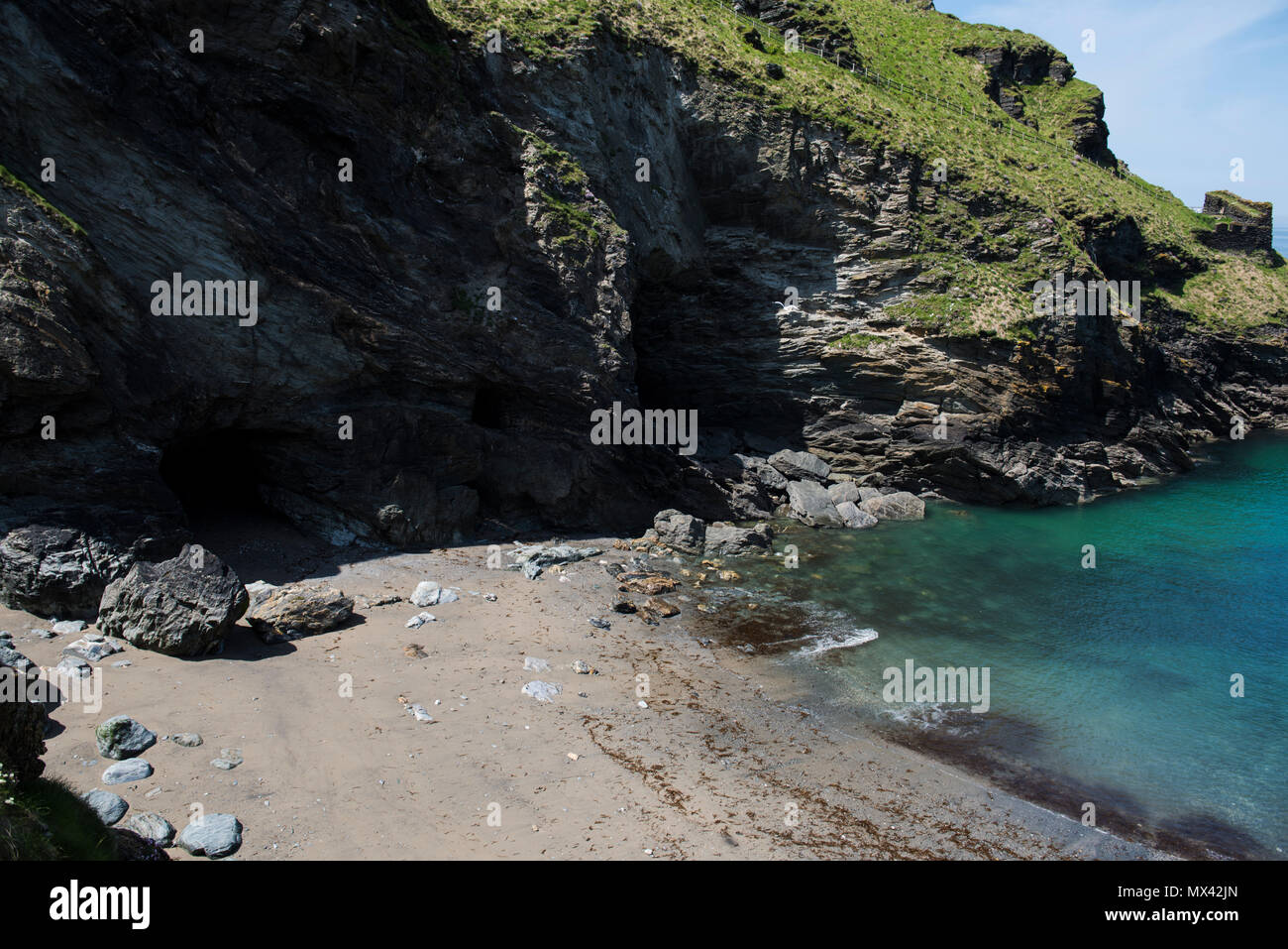 Merlin's cave, Tintagel, Cornwall UK Stock Photo - Alamy