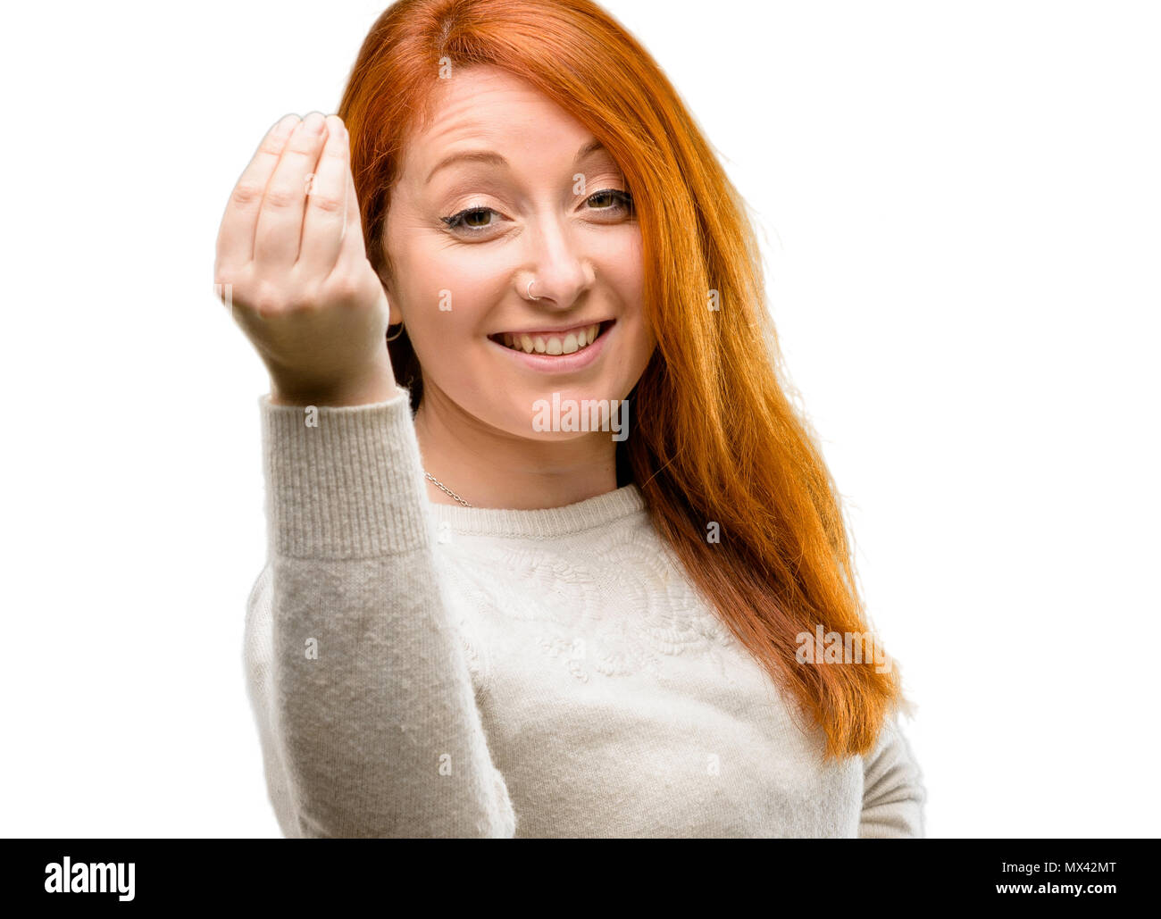 Beautiful young redhead woman angry gesturing typical italian gesture ...