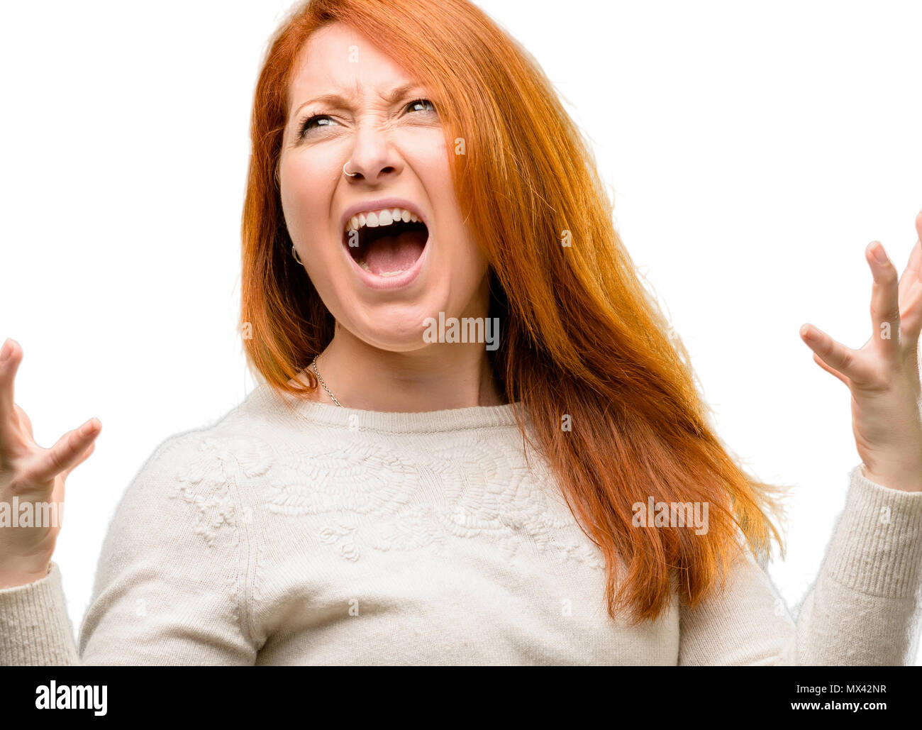 Beautiful young redhead woman terrified and nervous expressing anxiety ...