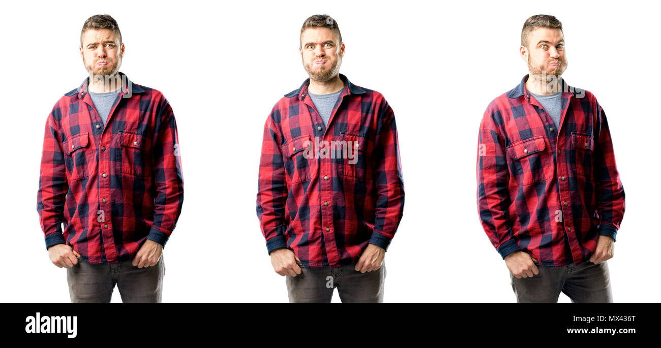 Young man puffing out cheeks, having fun making funny face isolated ...