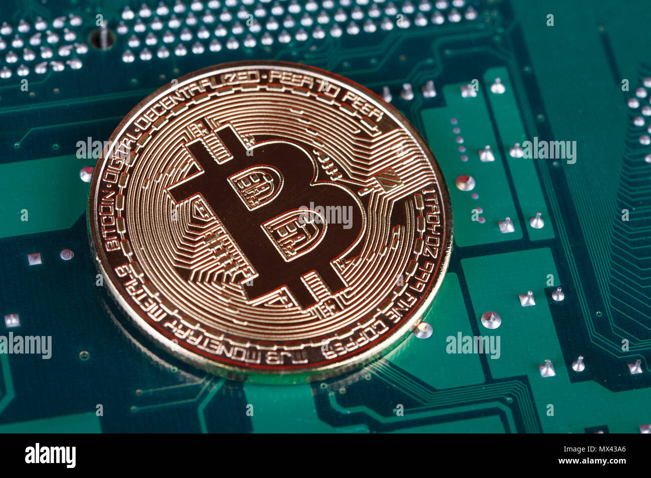 Bitcoin on printed circuit board Stock Photo - Alamy