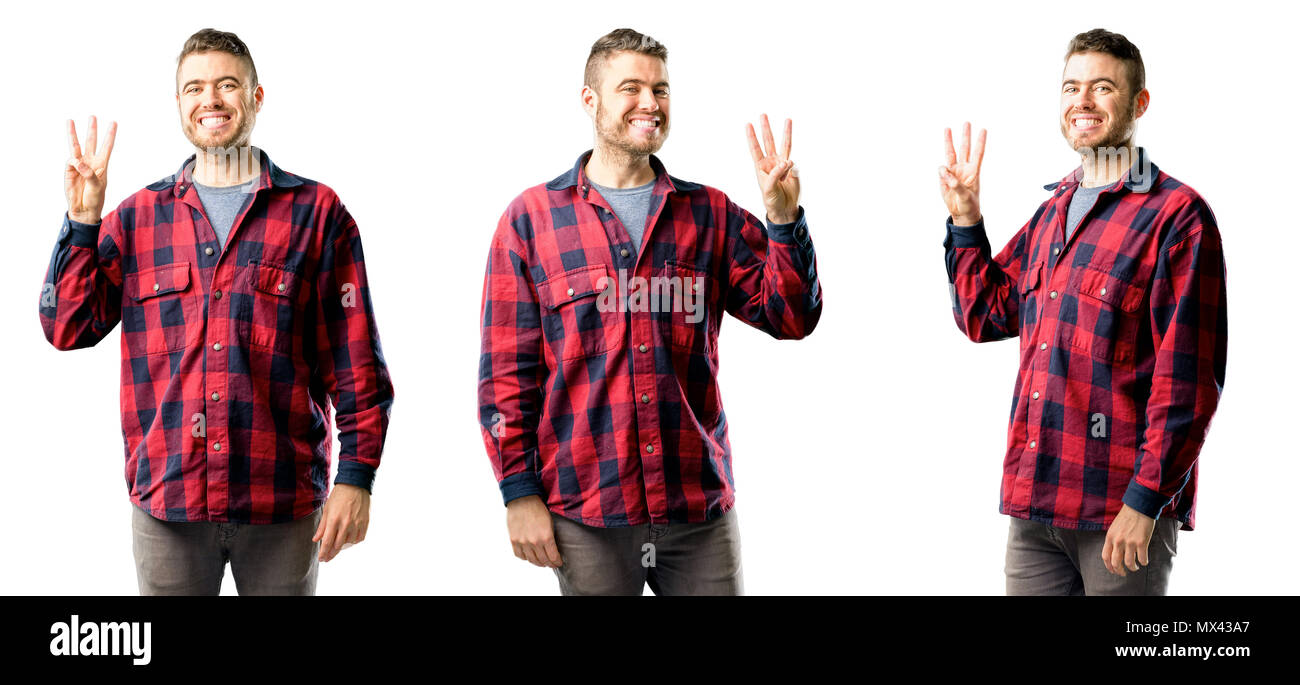 Young man raising his finger, is the number three isolated over white ...