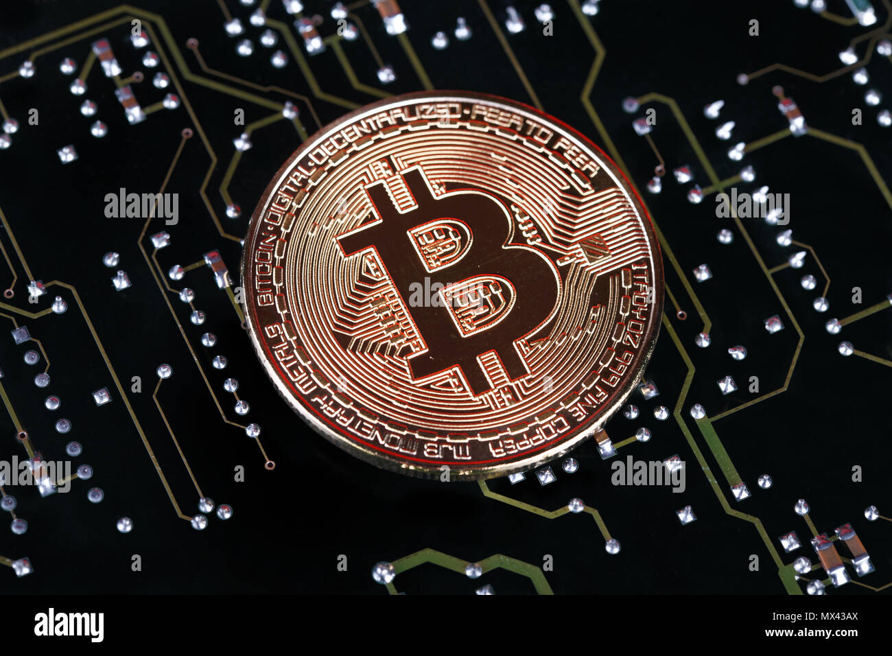 Bitcoin on printed circuit board Stock Photo - Alamy