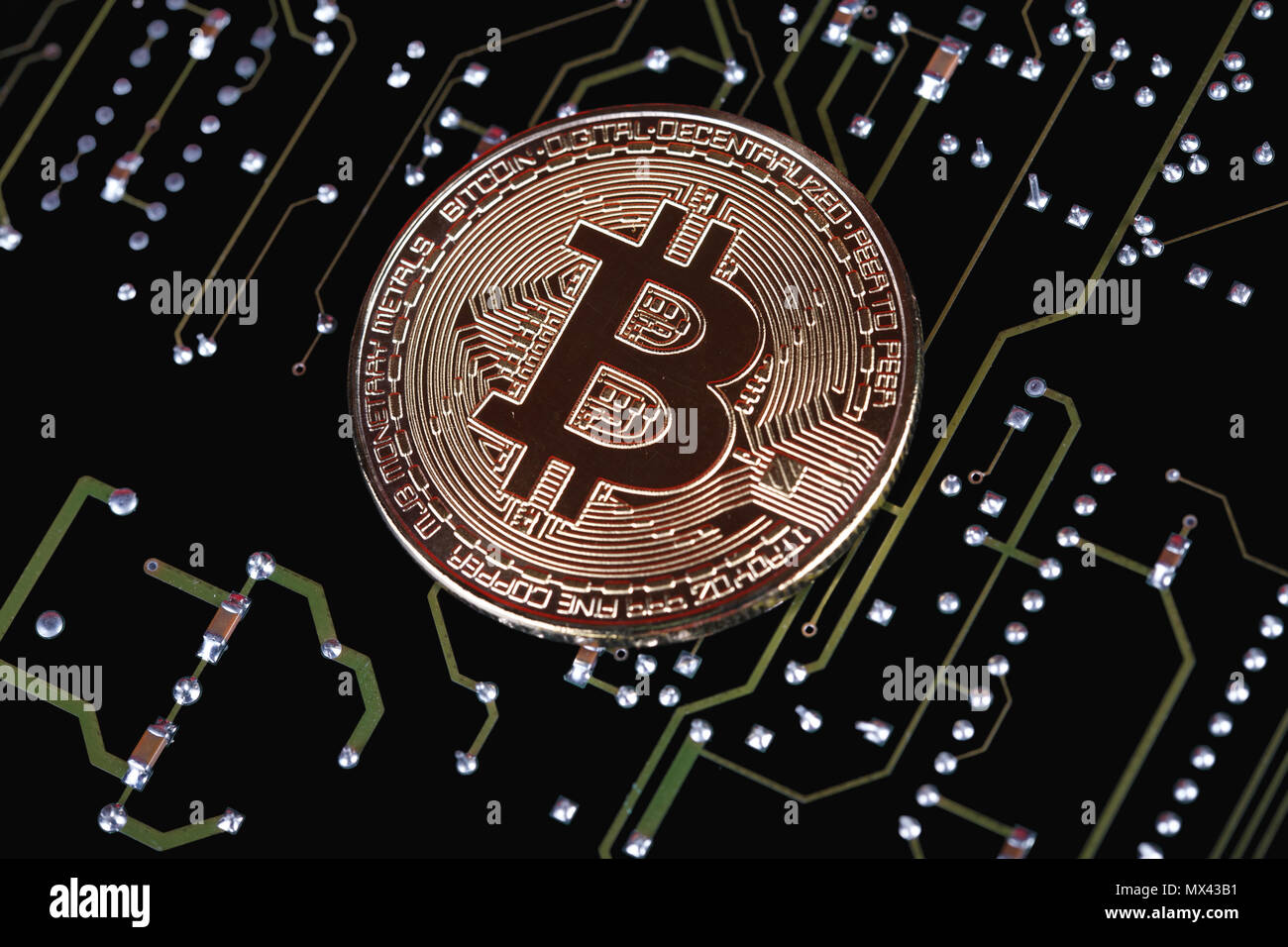 Bitcoin on printed circuit board Stock Photo - Alamy