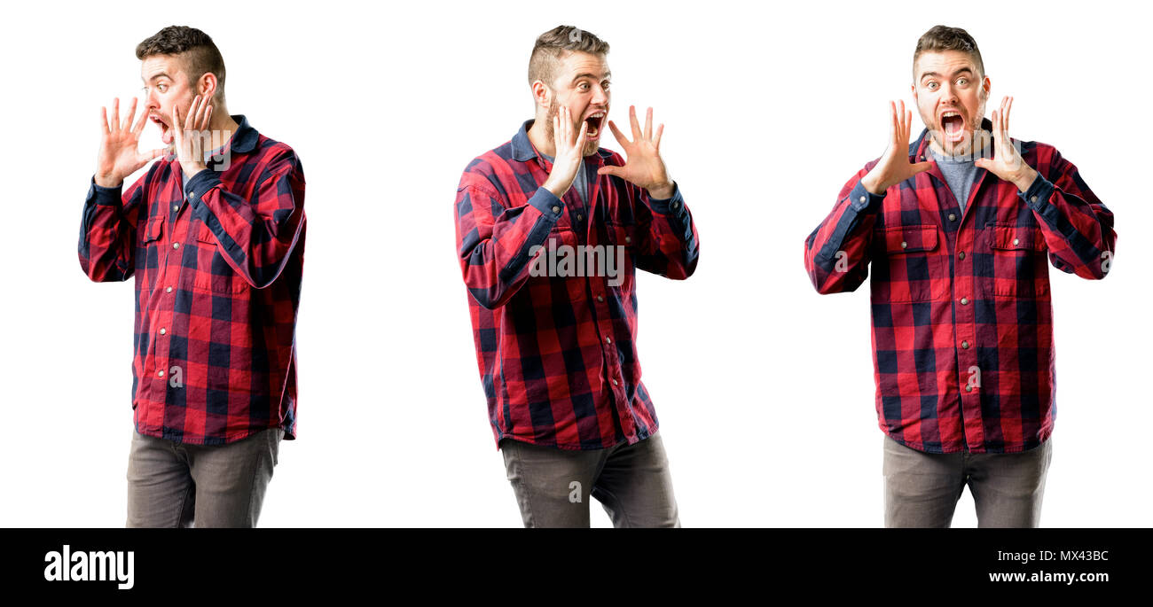 Young man stressful keeping hands on head, terrified in panic, shouting ...