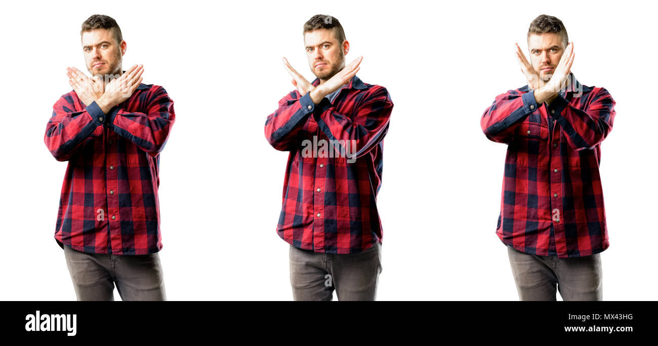 Young man annoyed with bad attitude making stop sign crossing hands ...