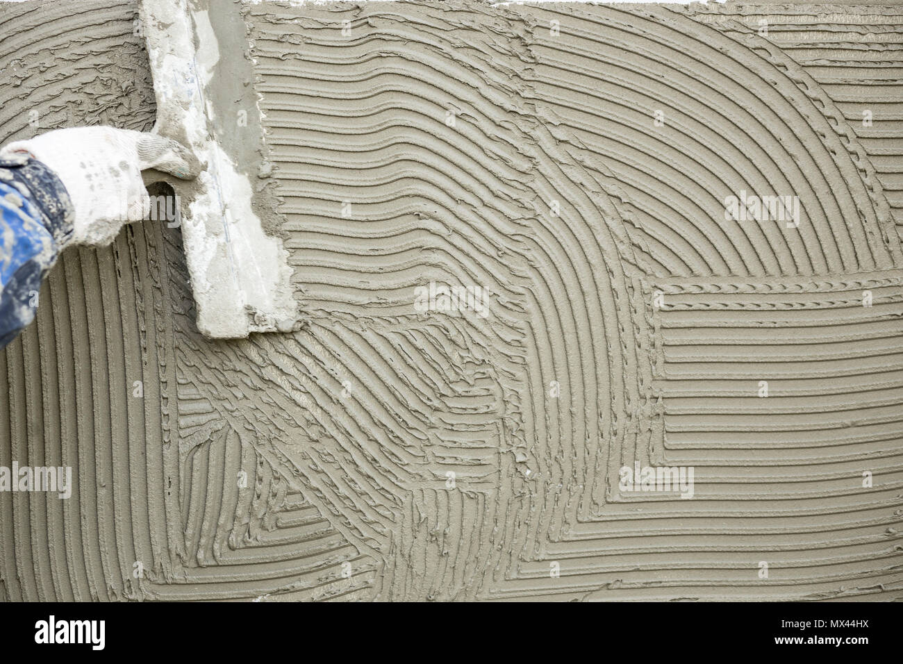 cement application using wet facade renovation technology Stock Photo ...