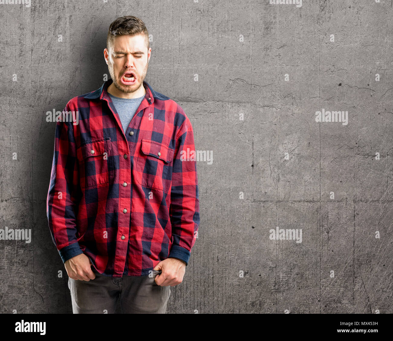 Young handsome man crying depressed full of sadness expressing sad ...