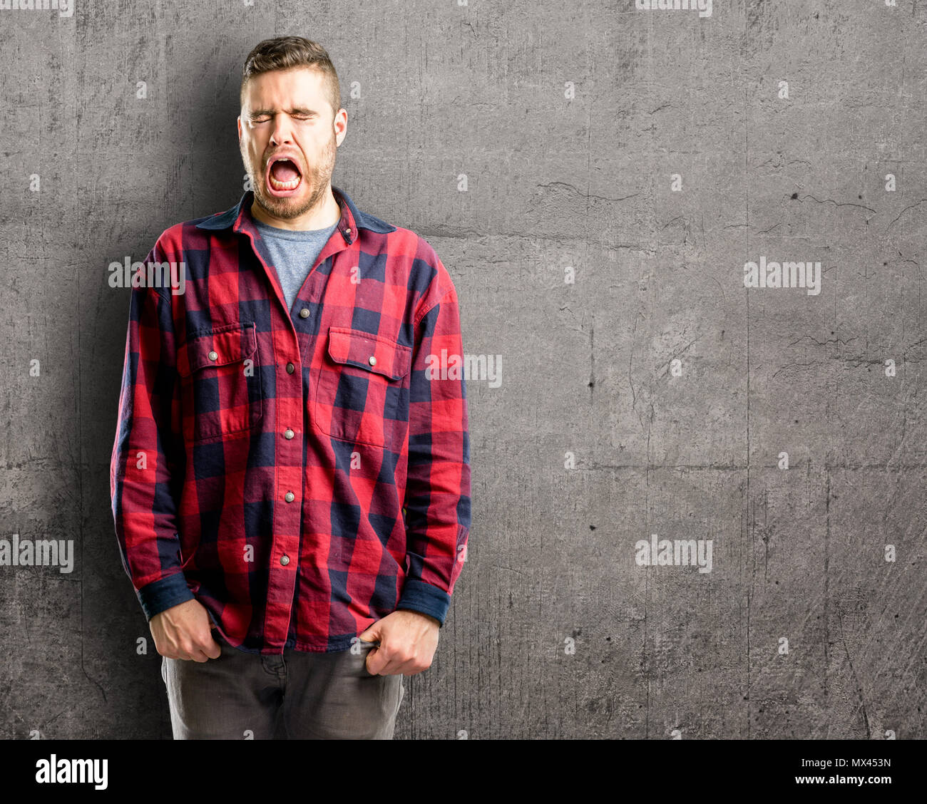 Young handsome man crying depressed full of sadness expressing sad ...