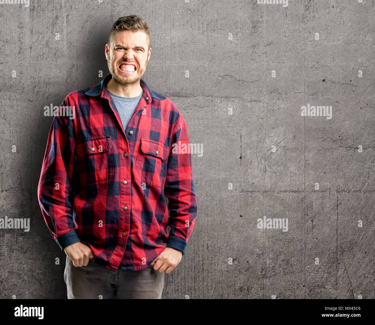 Angry man showing teeth hi-res stock photography and images - Alamy
