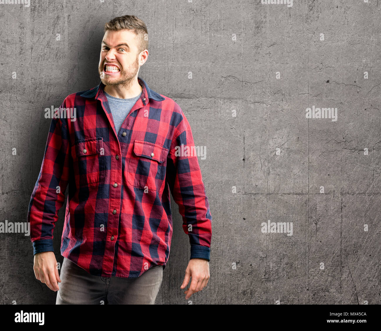 Angry man showing teeth hi-res stock photography and images - Alamy