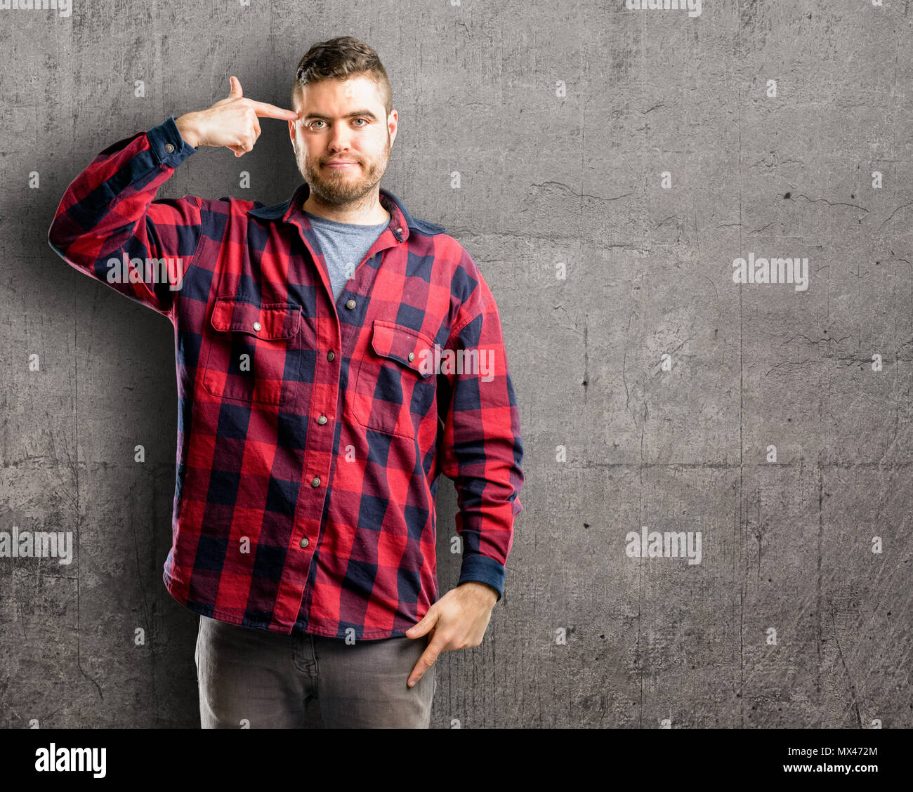 Man making finger gun gesture hi-res stock photography and images - Alamy