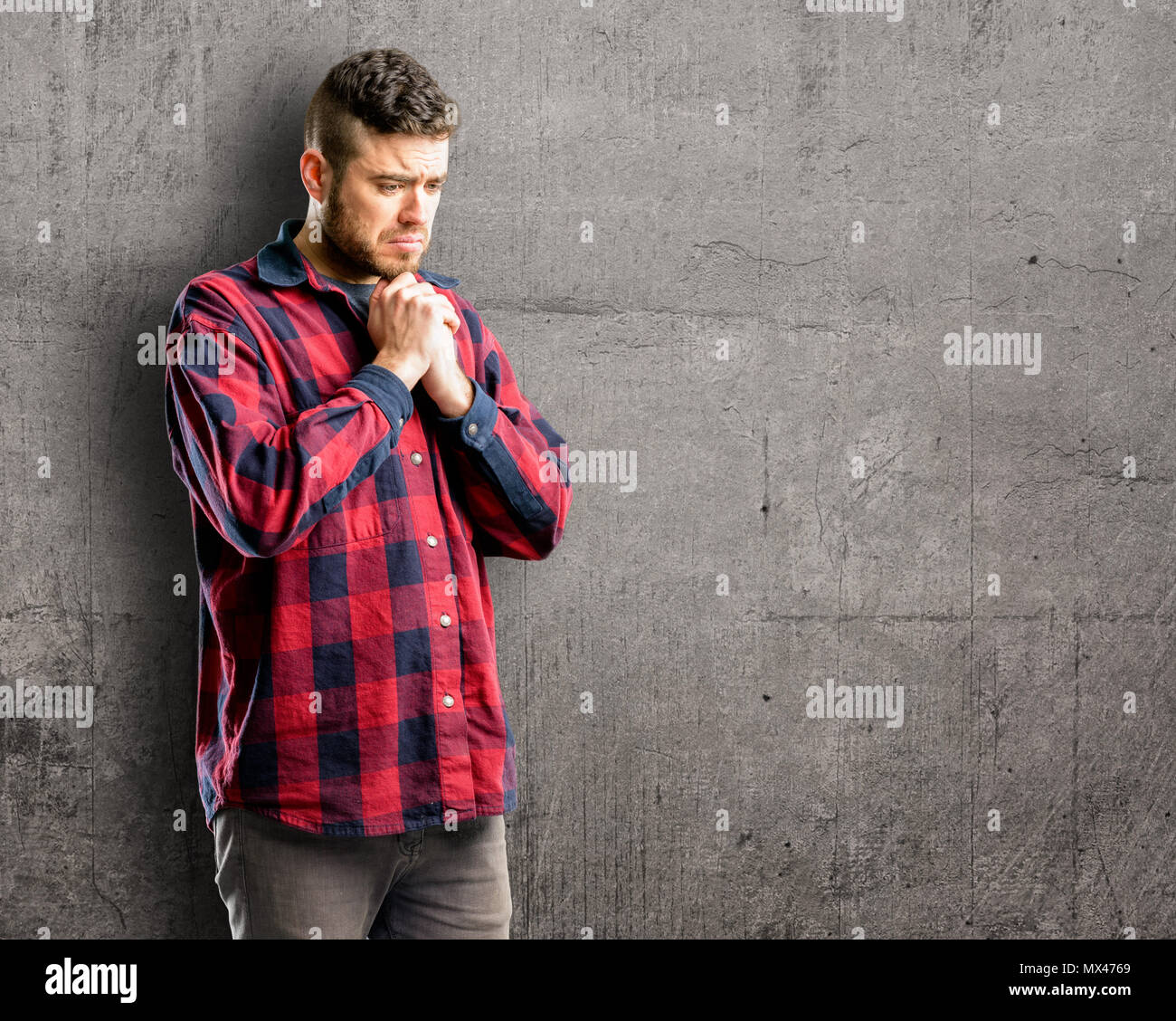 Young handsome man crying depressed full of sadness expressing sad ...