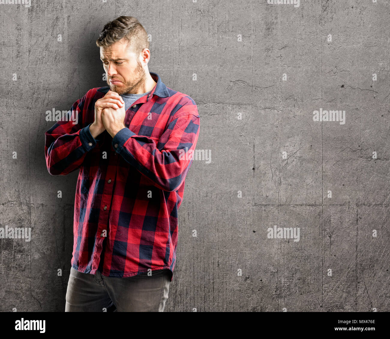 Young handsome man crying depressed full of sadness expressing sad ...