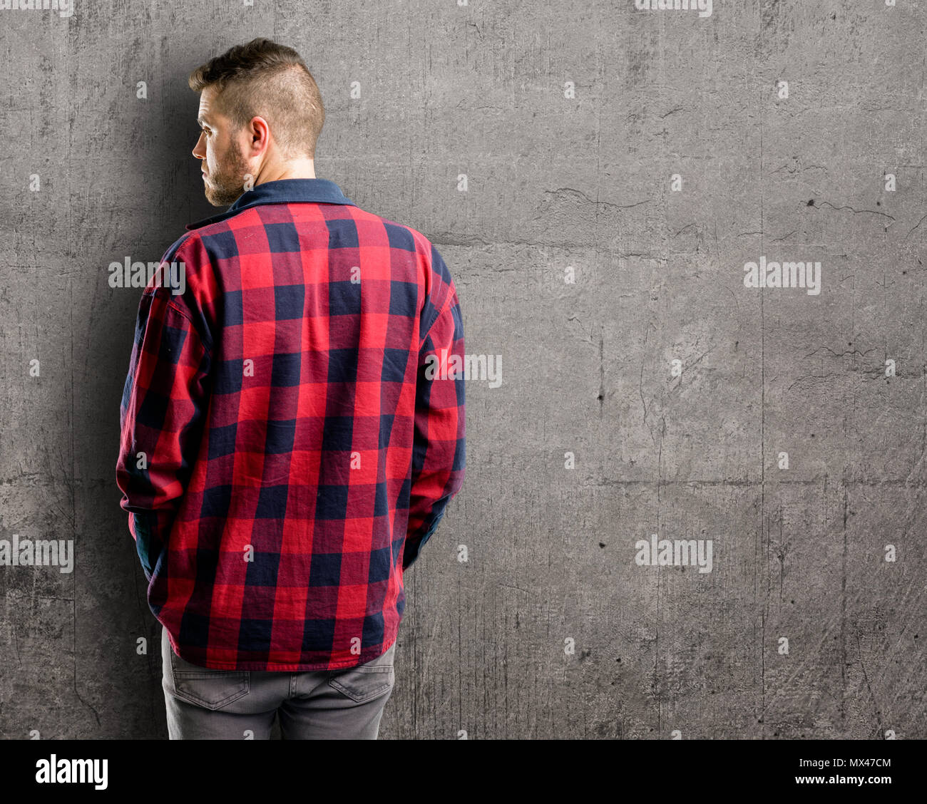 Man back head turned standing hi-res stock photography and images - Alamy