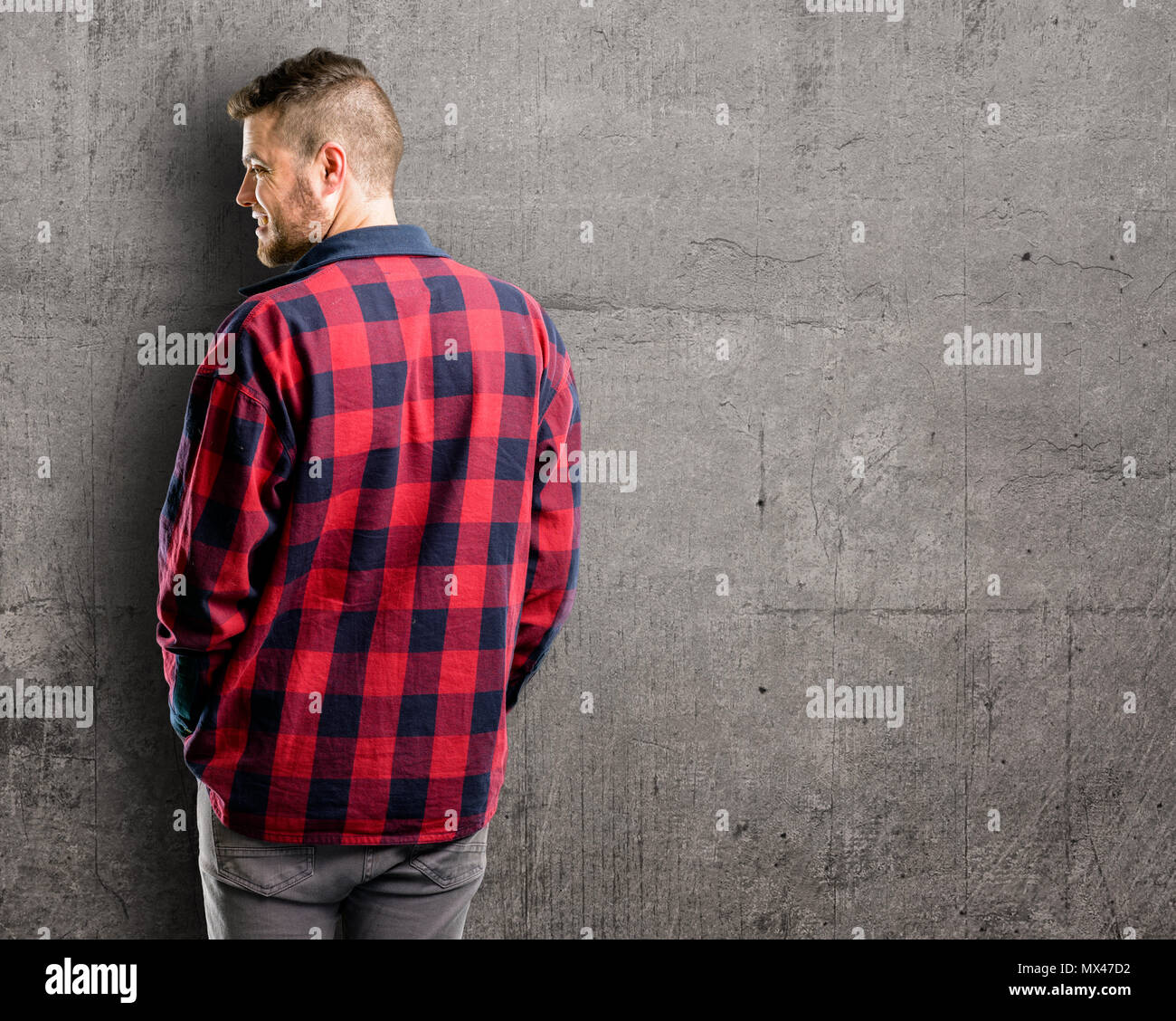 Young handsome man backside, rear view Stock Photo - Alamy