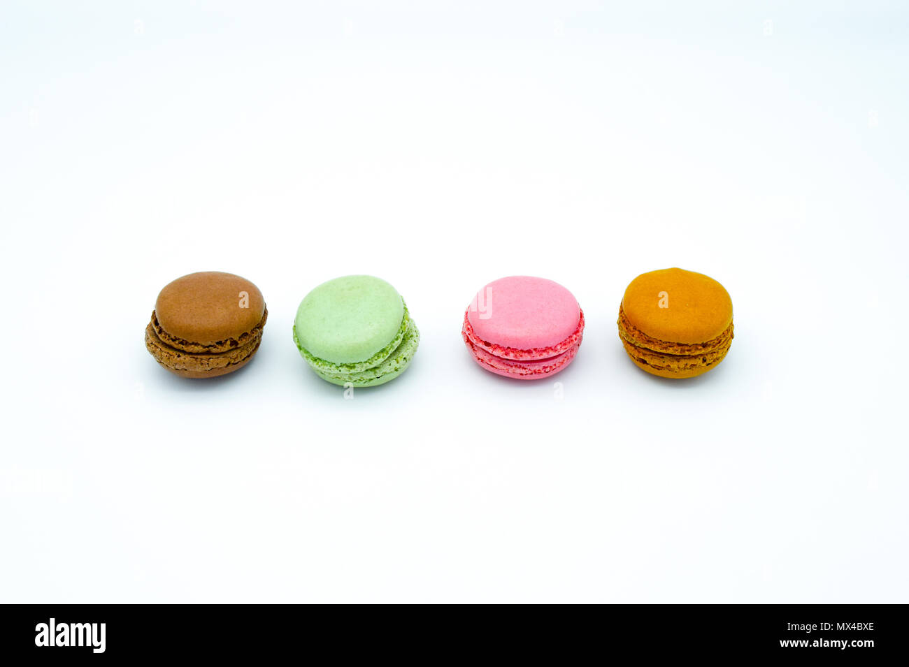 macarons isolated on white background, sweet colorful macarons in row ...