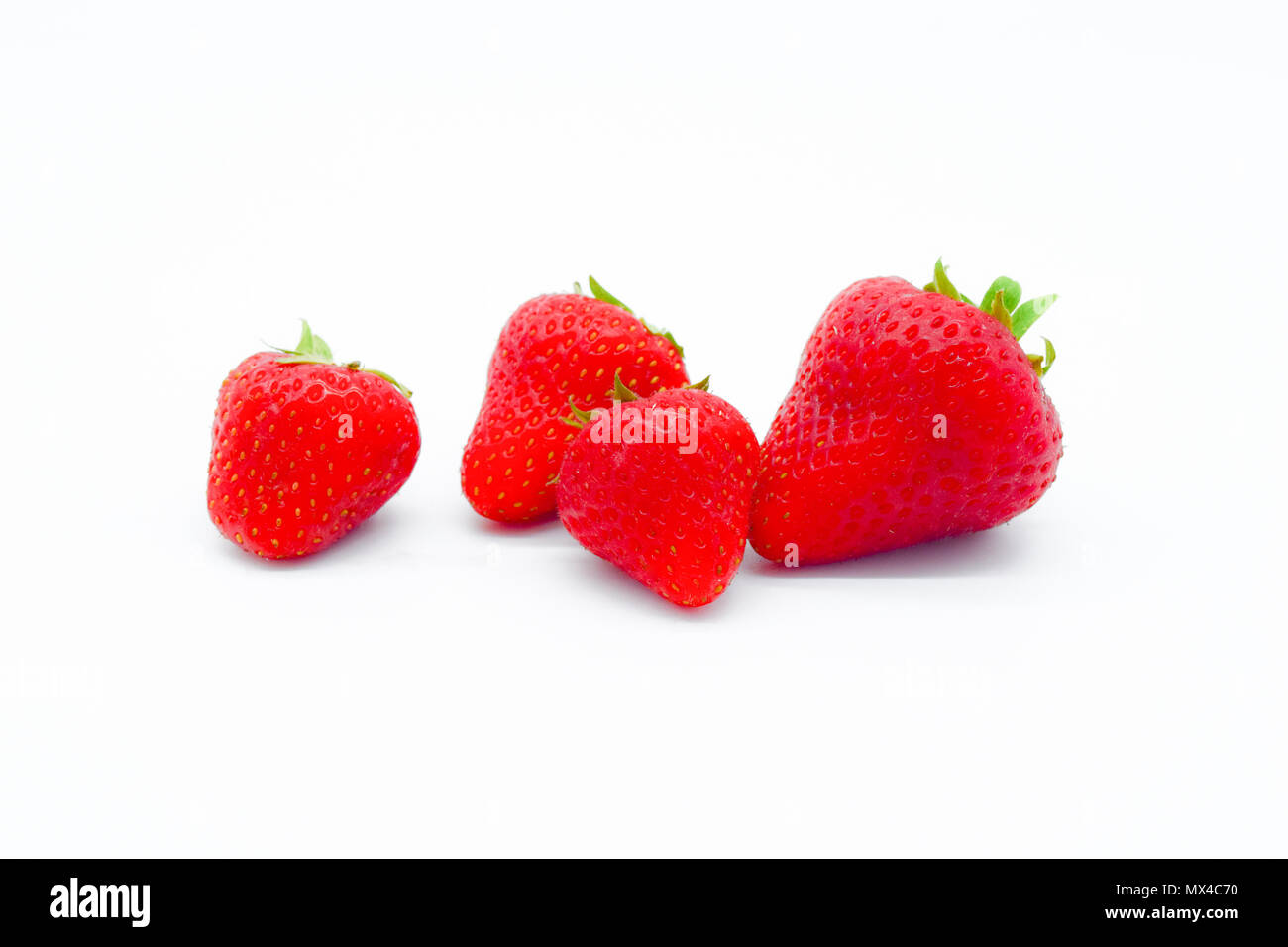 fresh strawberries fruits isolated on white background Stock Photo - Alamy