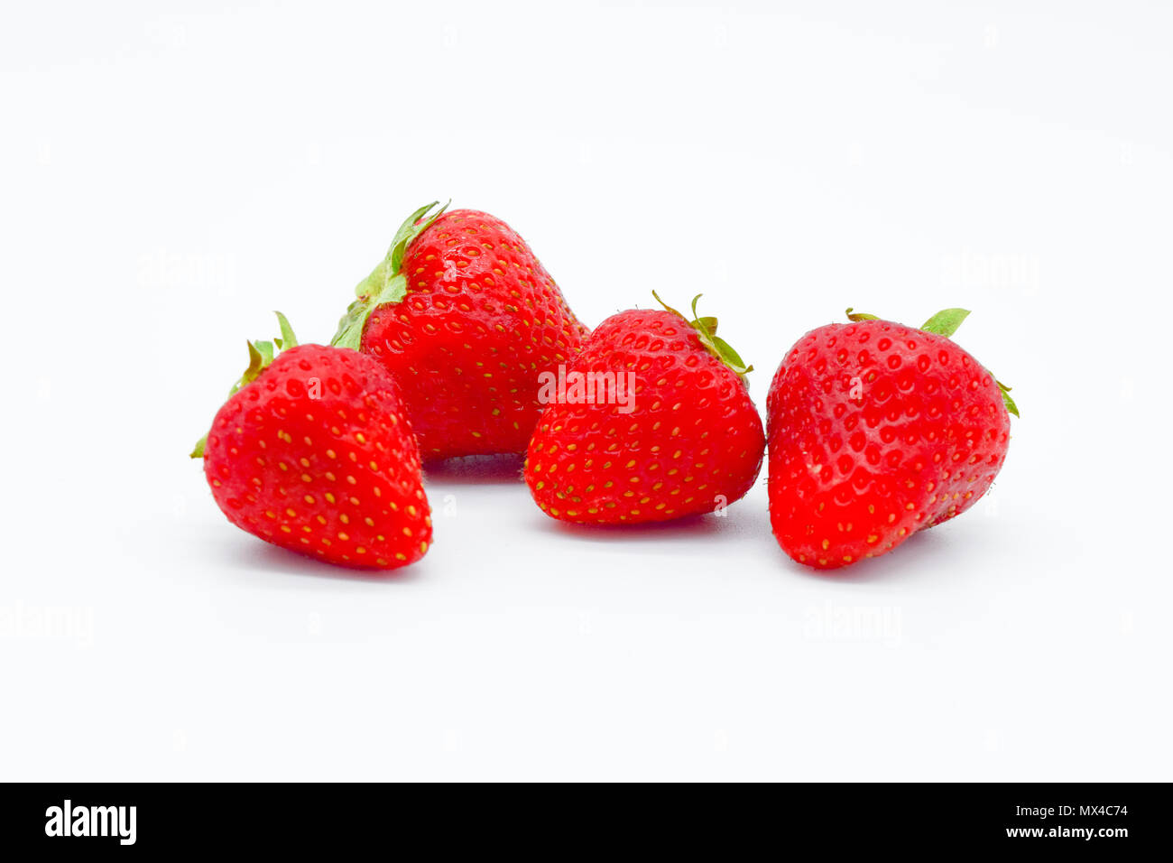 fresh strawberries fruits isolated on white background Stock Photo - Alamy