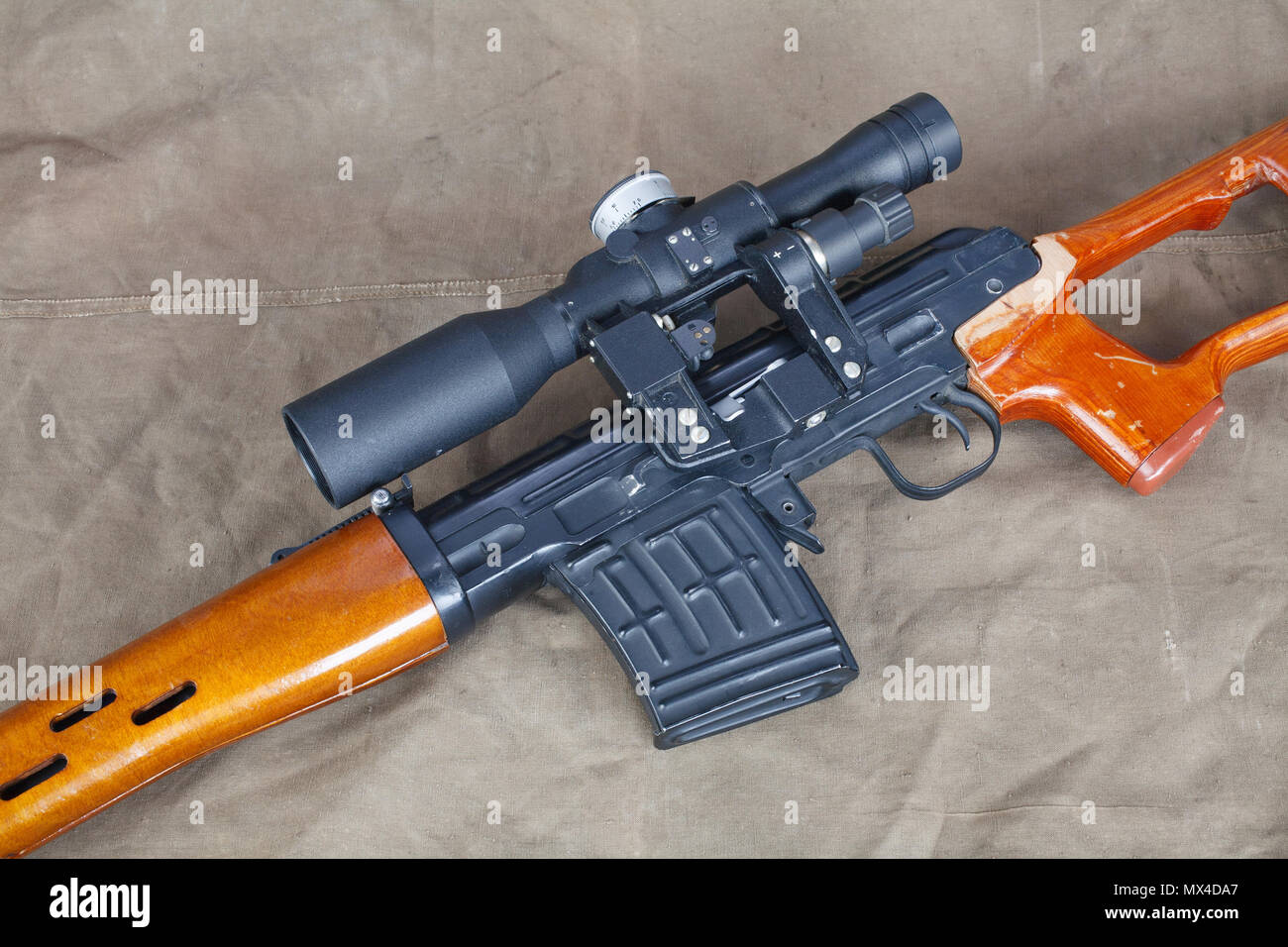 SVD sniper rifle on khaki canvas background Stock Photo - Alamy