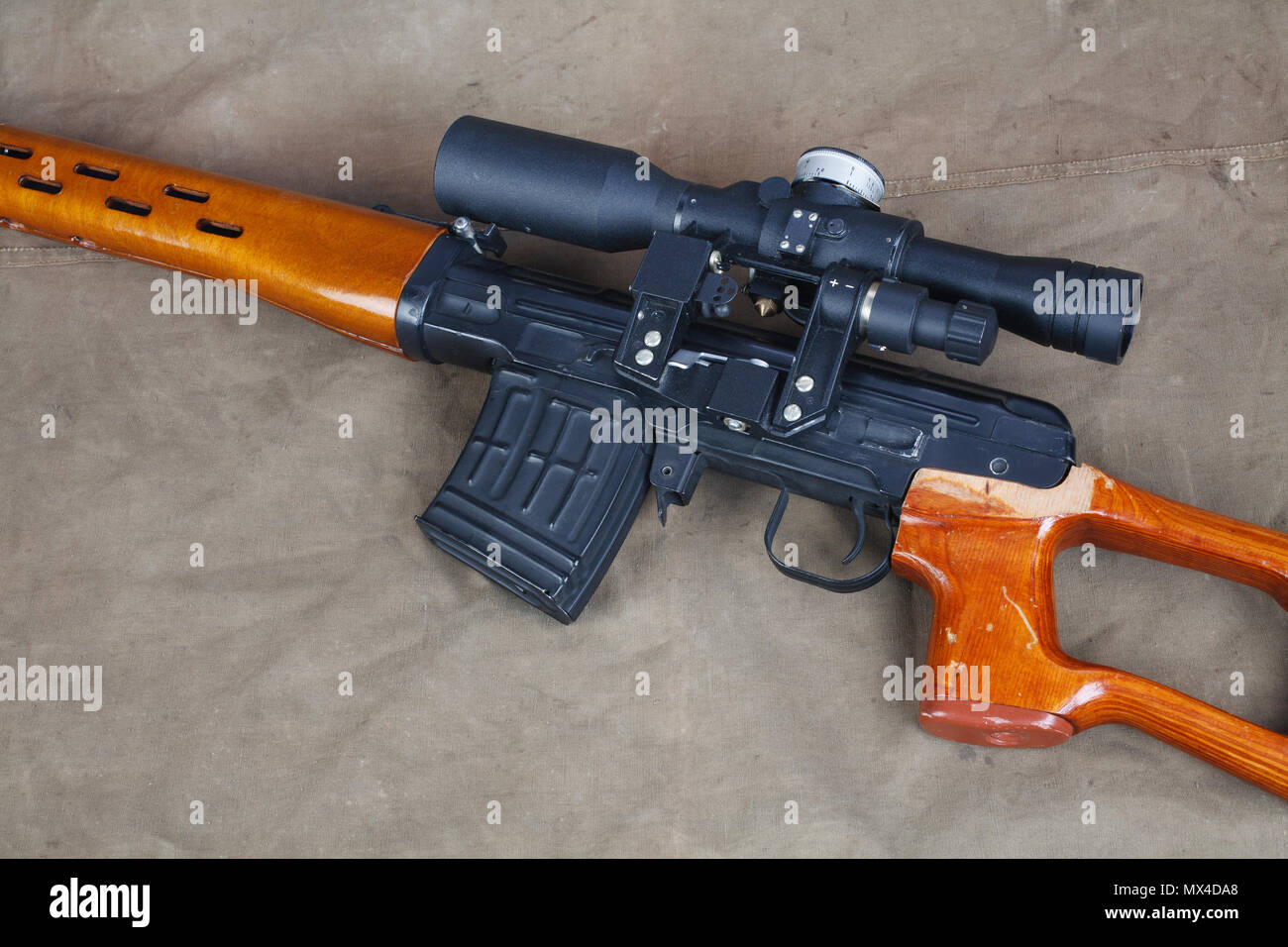 SVD sniper rifle on khaki canvas background Stock Photo - Alamy