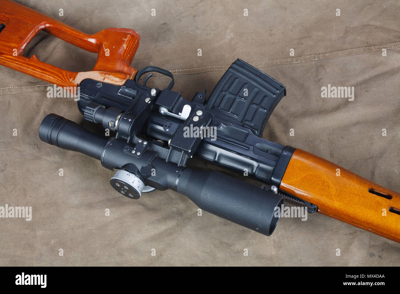 SVD sniper rifle on khaki canvas background Stock Photo - Alamy