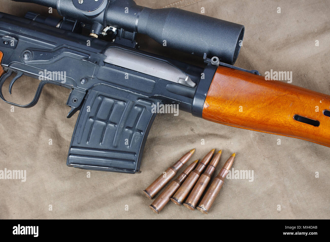 SVD sniper rifle on khaki canvas background Stock Photo - Alamy