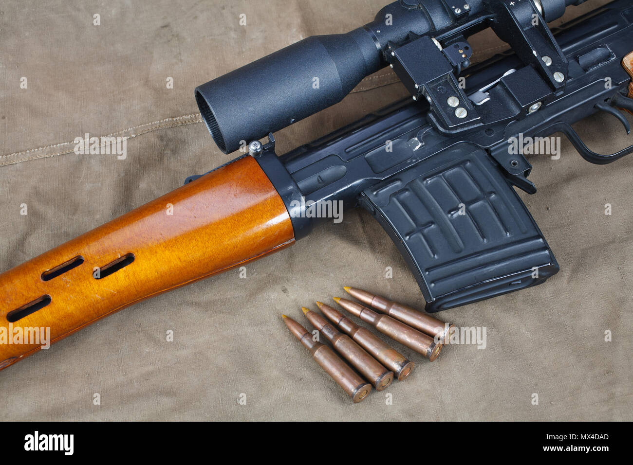 SVD sniper rifle on khaki canvas background Stock Photo - Alamy