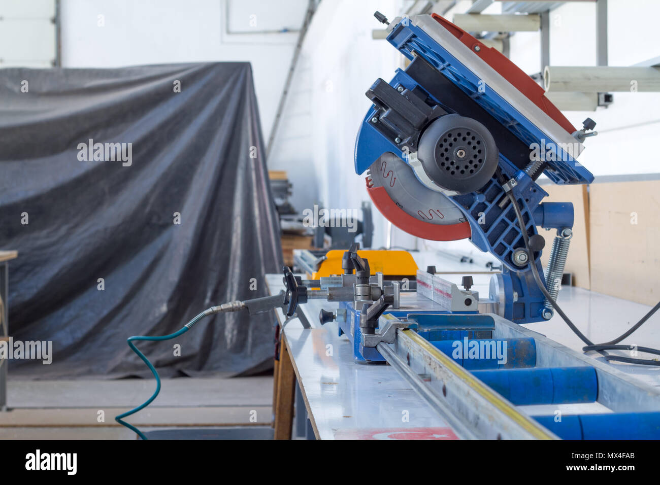 Industrial circular saw and vertical cutter in workshop Stock Photo - Alamy