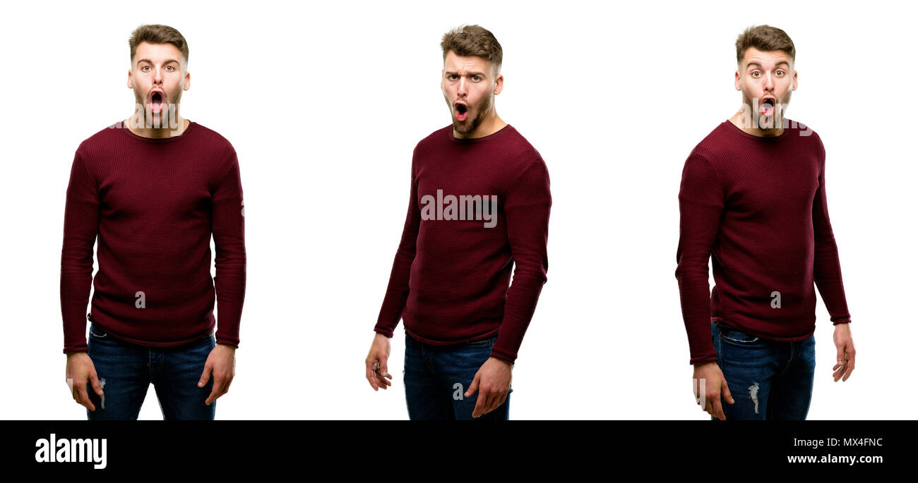 Handsome blond man happy and surprised cheering expressing wow gesture ...