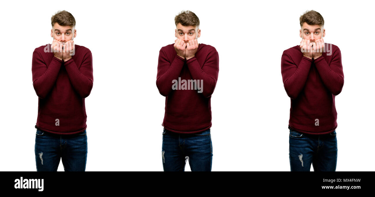 Handsome blond man terrified and nervous expressing anxiety and panic ...