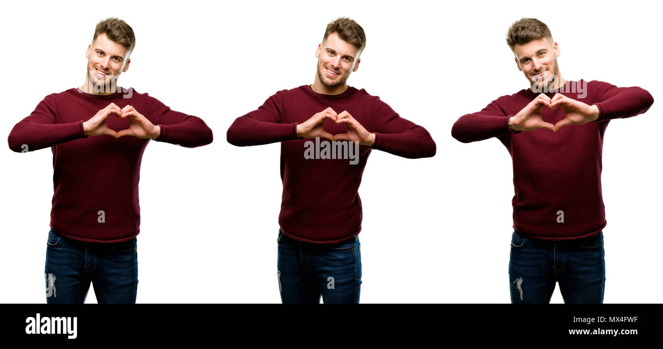 Handsome blond man happy showing love with hands in heart shape ...