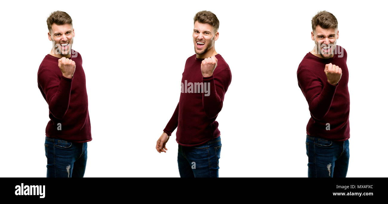 Handsome blond man happy and excited expressing winning gesture ...