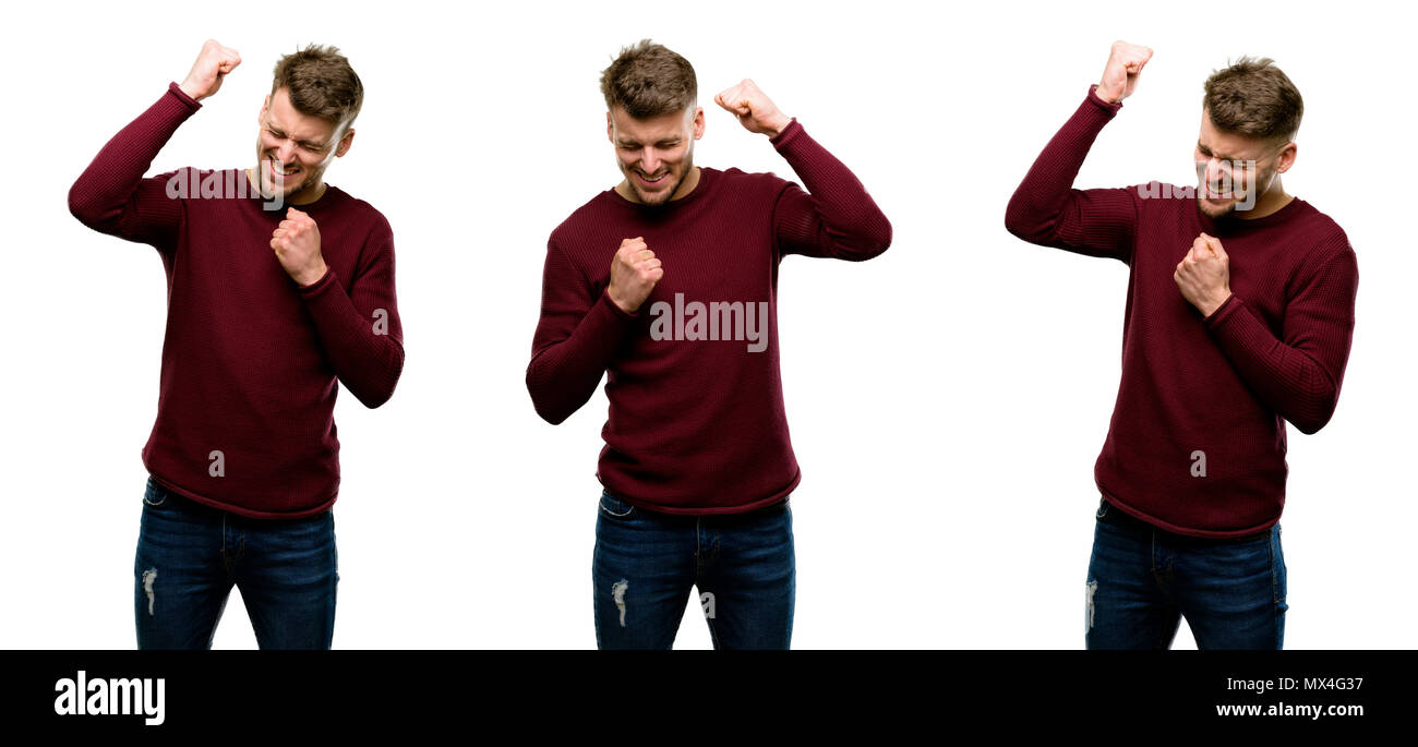 Handsome blond man happy and excited expressing winning gesture ...