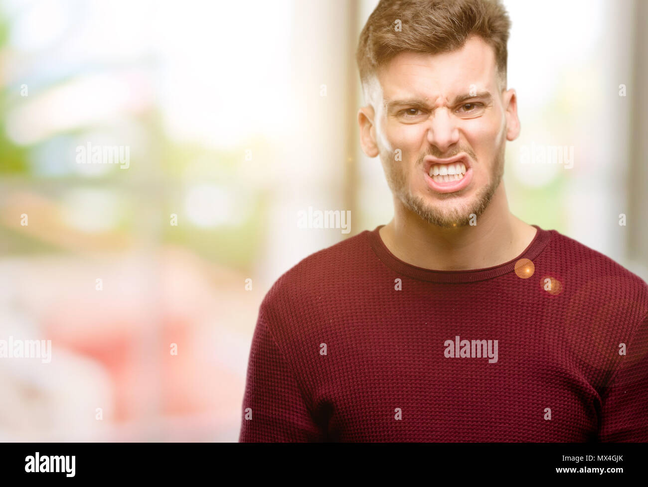 Angry man showing teeth hi-res stock photography and images - Alamy