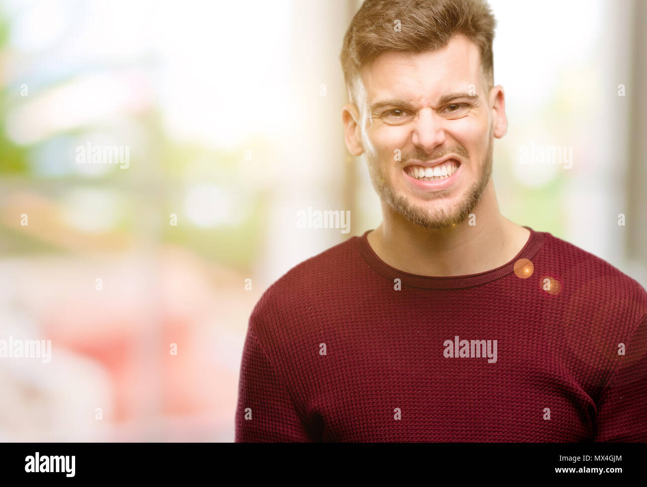 Angry man showing teeth hi-res stock photography and images - Alamy