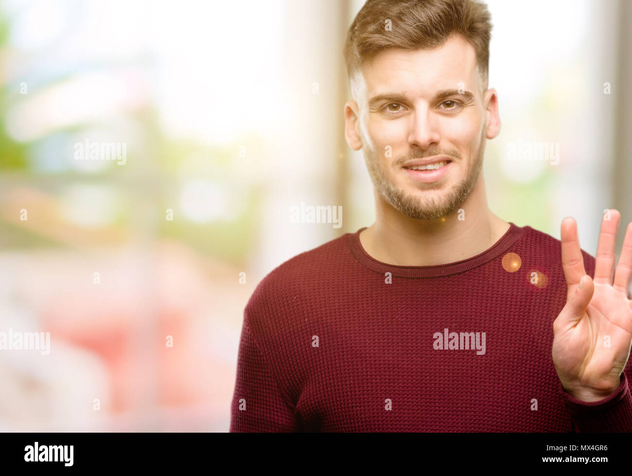 Hispanic student raising hand hi-res stock photography and images - Alamy