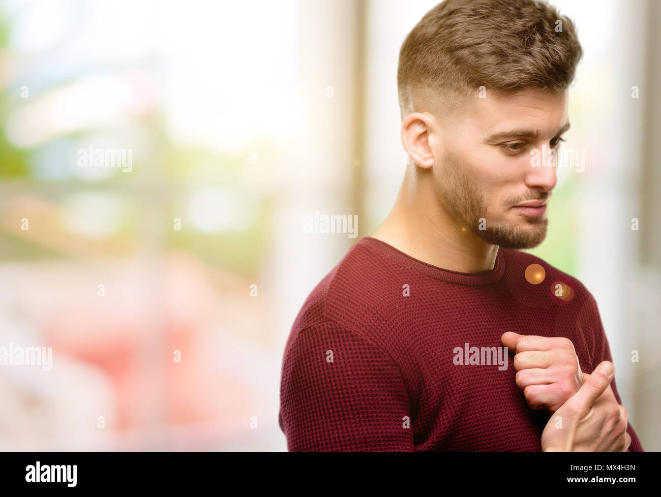 Handsome young man crying depressed full of sadness expressing sad ...