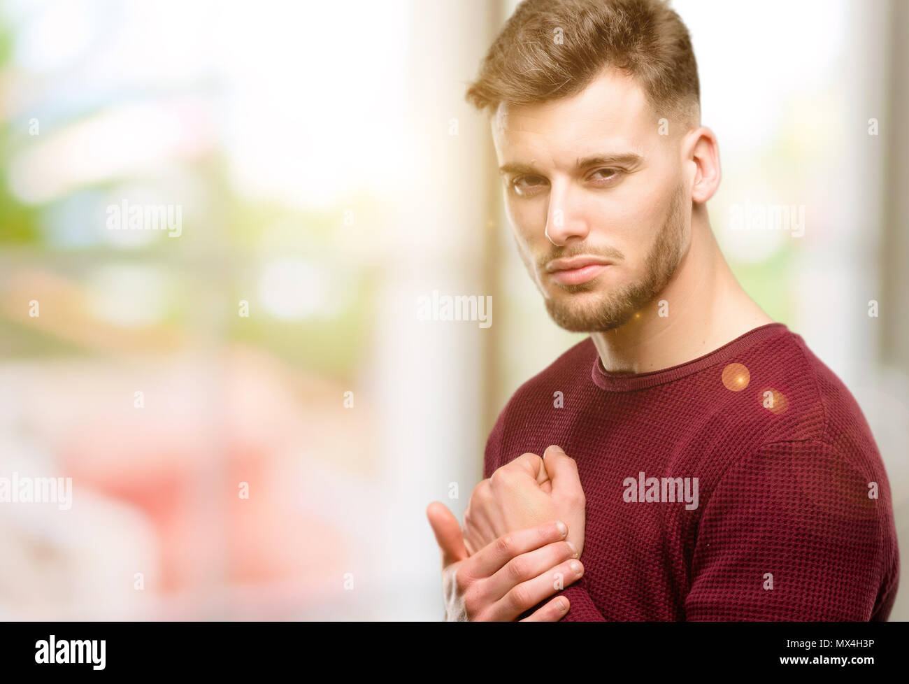 Handsome young man crying depressed full of sadness expressing sad ...