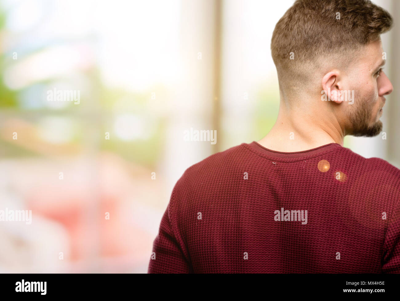 Handsome young man backside, rear view Stock Photo - Alamy