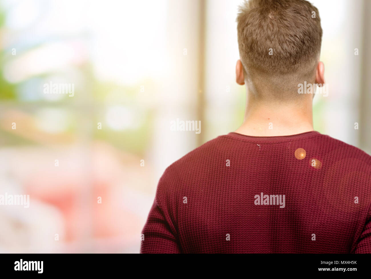 Handsome young man backside, rear view Stock Photo - Alamy