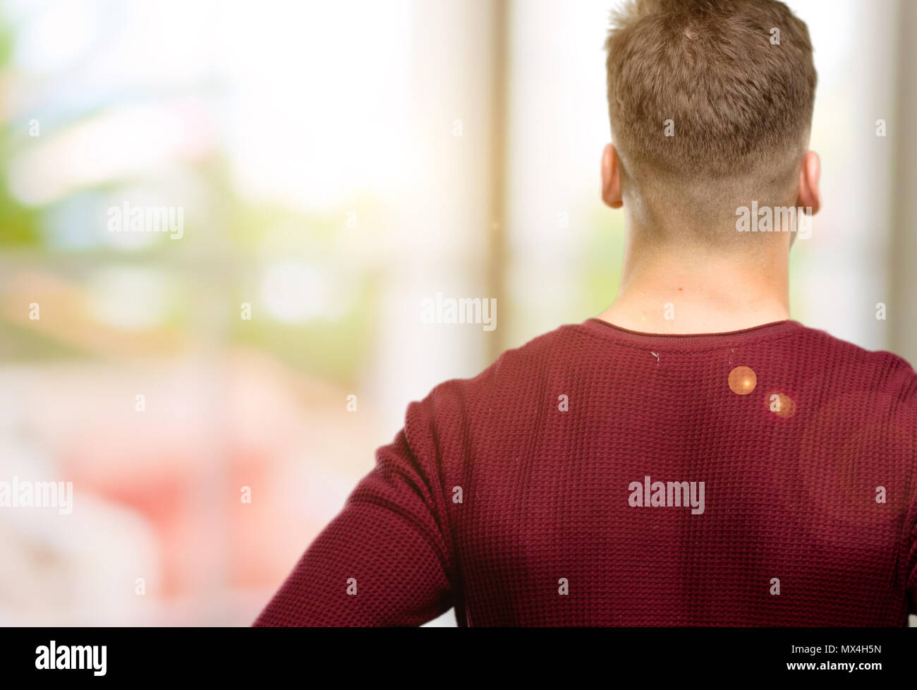 Handsome young man backside, rear view Stock Photo - Alamy