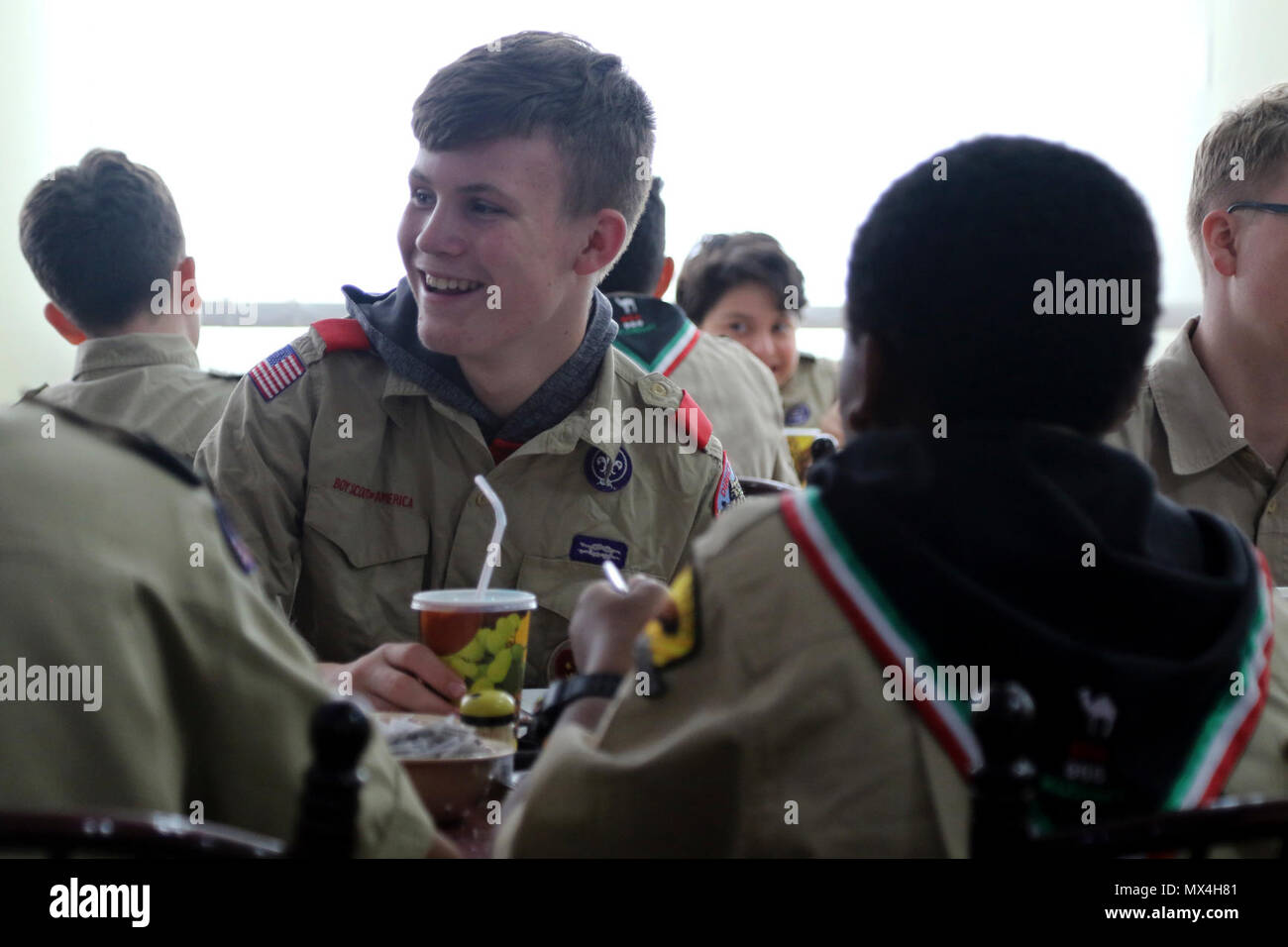 Troops from Boy Scouts 965 Kuwait enjoyed lunch after earning their ...