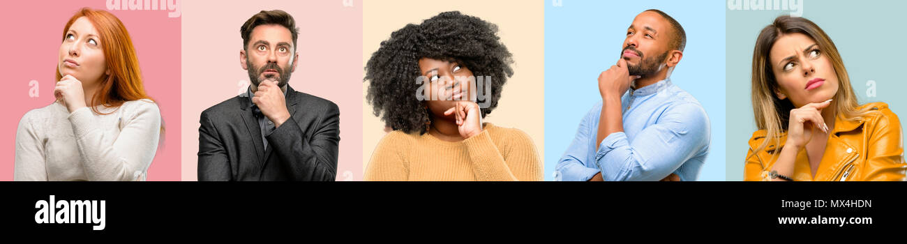 Cool group of people, woman and man thinking and looking up expressing ...
