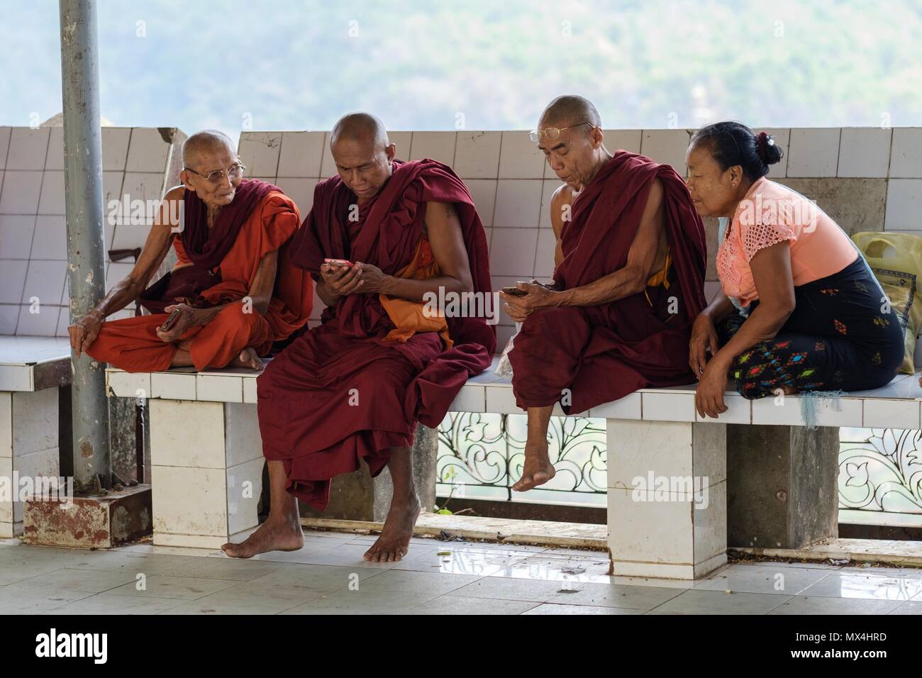 Buddhist monks using smart phones, Mount Popa near Bagan, Myanmar Stock ...
