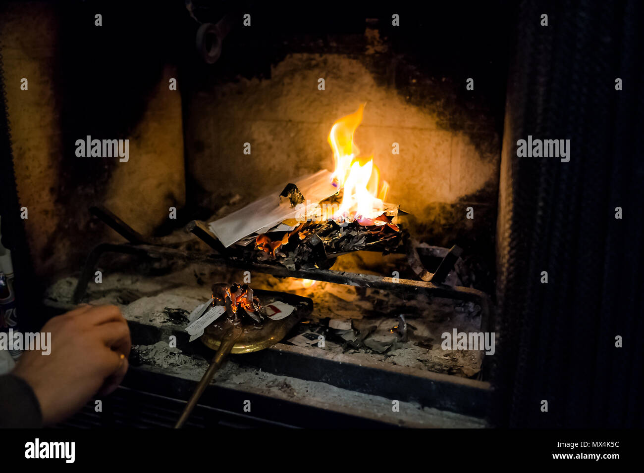 Old man by fireplace hi-res stock photography and images - Alamy
